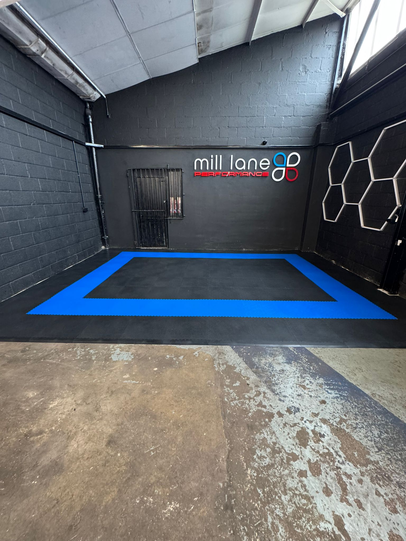 Workshop Floor Tile Installation London | Garage Style Ltd